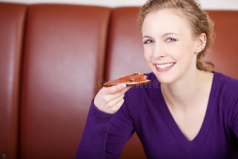 Woman eating bread and jam stock photo. Image of shop - 31343664