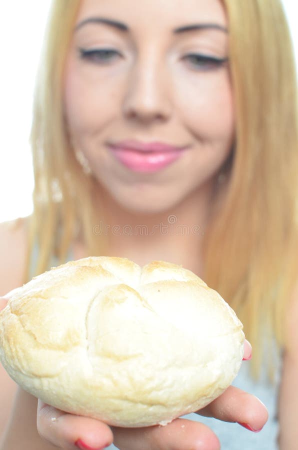 Woman eating bread roll stock photo. Image of lunch, meal - 37589564