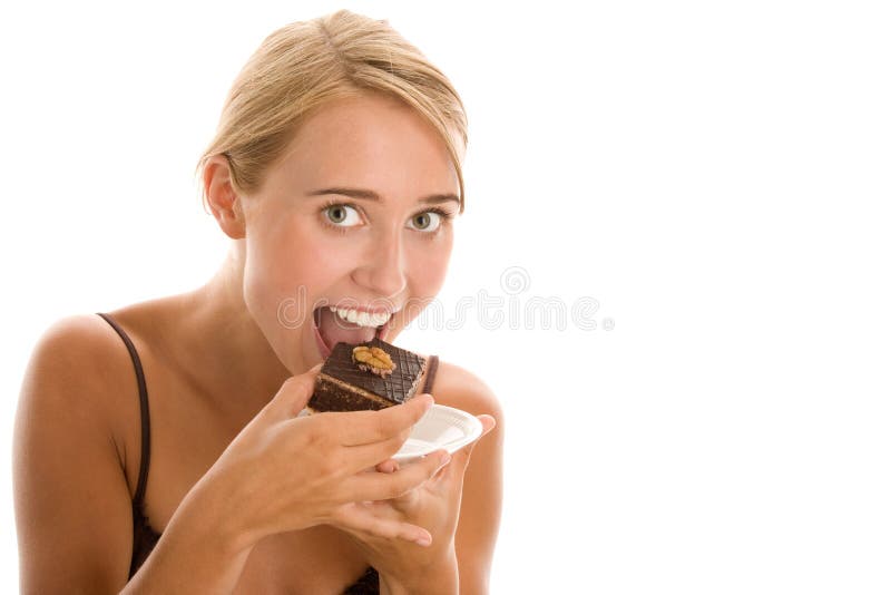 Girl eating piece of cake. stock image. Image of human - 9298747