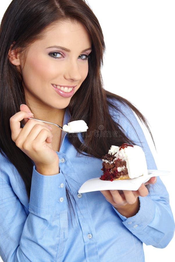 Woman eating the cake. stock photo. Image of calories - 6965104