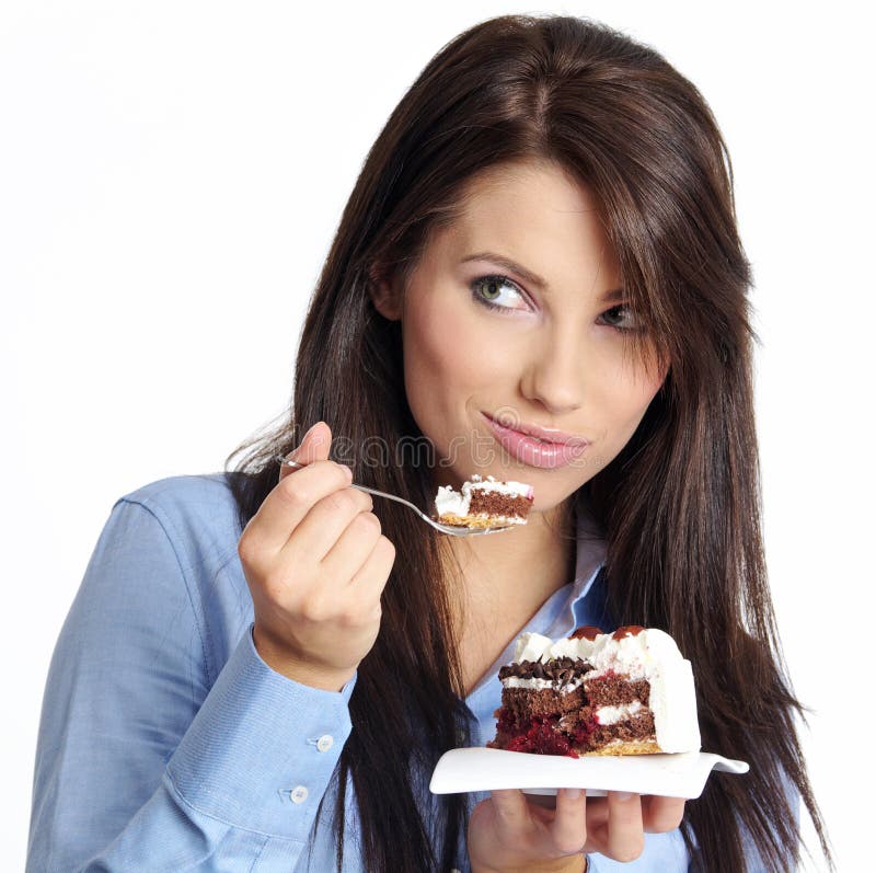 Woman eating the cake. stock photo. Image of freshness - 6965240