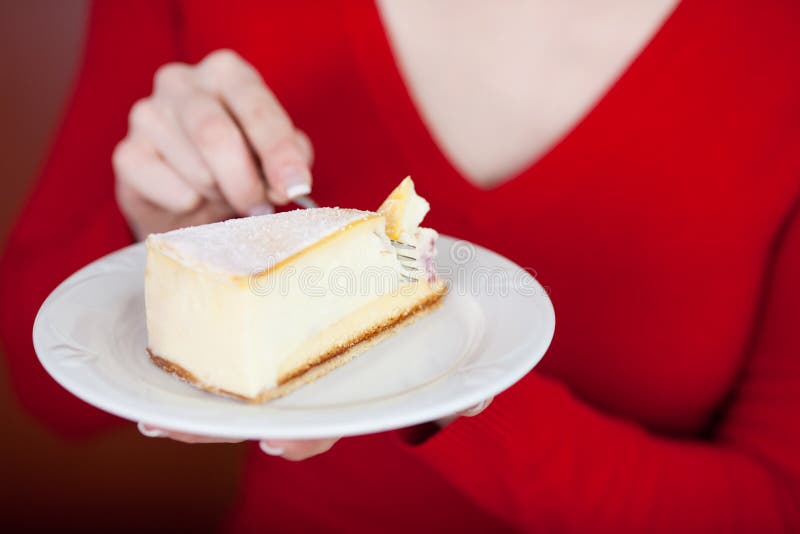 Woman eating cheese cake stock image. Image of eating - 31343273
