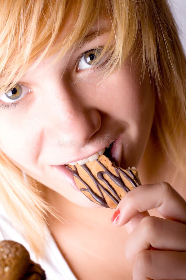 Woman Eating Chocolate Chip Cookies Stock Photo - Image of delicious ...