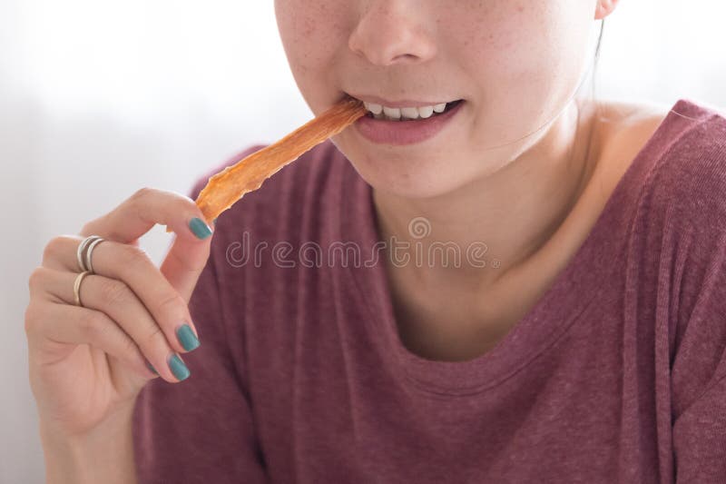 Woman eating close-up stock photo. Image of closeuptaken - 78239852