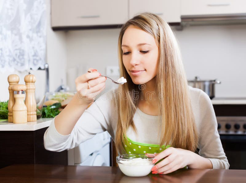Woman Eating Curd Cheese in Home Stock Photo - Image of diet, people ...