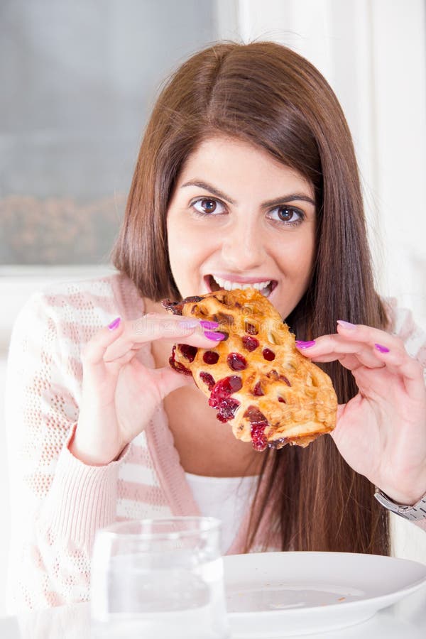 Woman eating dessert stock photo. Image of eyes, brown - 38116236