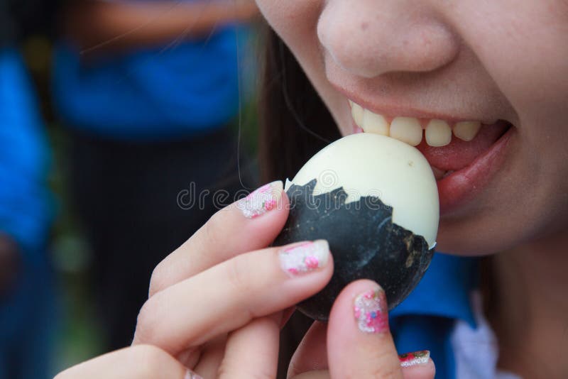 Woman eating egg stock image. Image of design, cuisine - 33250489