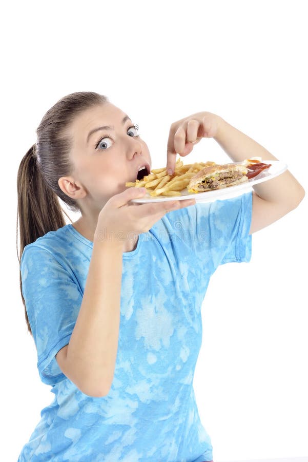 Woman eating fast food stock image. Image of girl, drink - 34865383