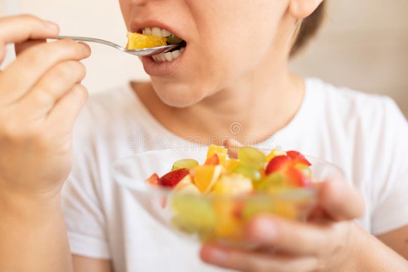 Woman Eating Fruit during Snack Stock Photo - Image of snack, food ...