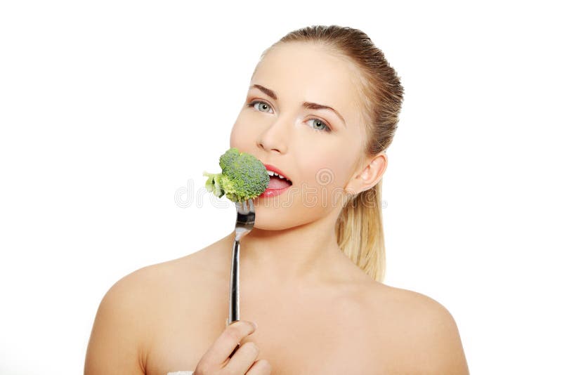 Woman Eating Green Broccoli Stock Photo - Image of broccoli, caucasian ...