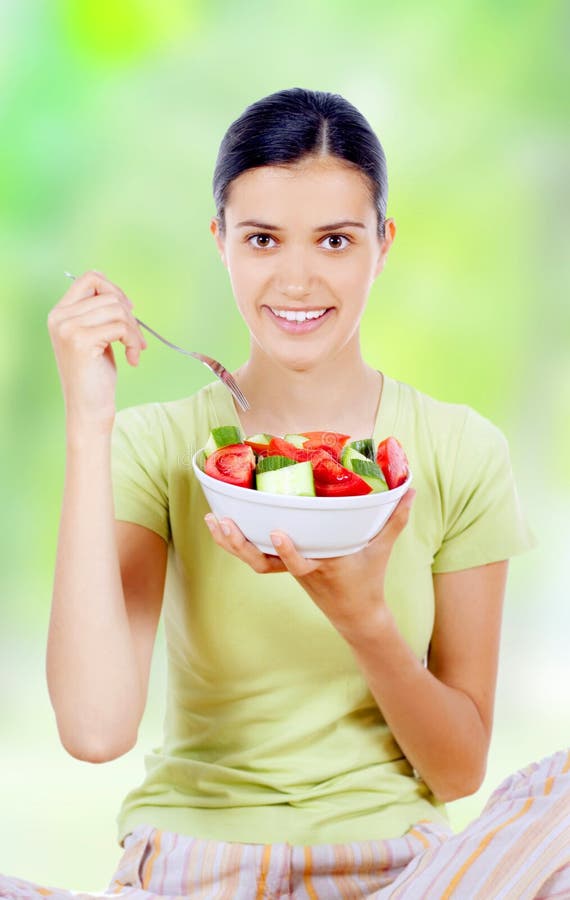 Woman eating healthy food stock image. Image of salad - 5496995