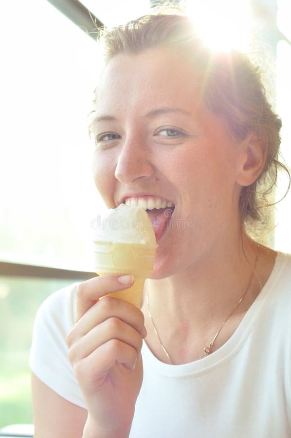 Young Woman Eating Ice Cream In Waffle Cone Stock Image Image Of