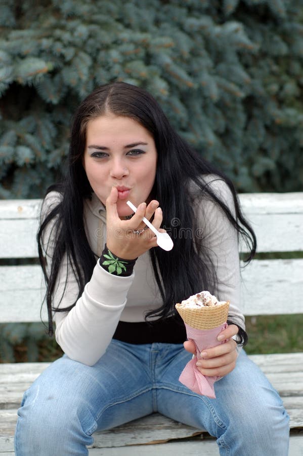 Woman eating ice-cream stock photo. Image of relaxed, cheerful - 3176632