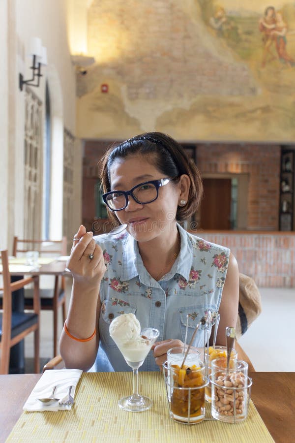 Woman Eating Ice Cream with Happiness Face Stock Image - Image of ...