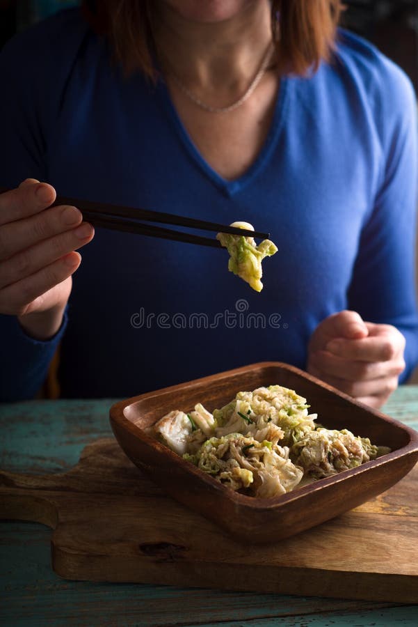 Woman Eating Kimchi Vertical Stock Photos - Free & Royalty-Free Stock ...