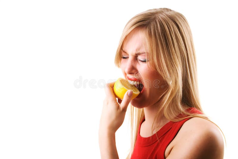 Woman eating lemon stock photo. Image of unpleasant, teeth - 12183956