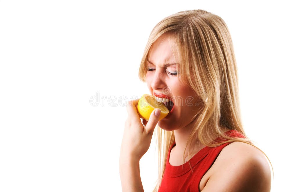 Woman eating lemon stock photo. Image of unpleasant, teeth - 12183956