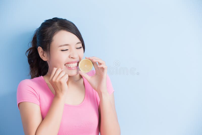 Woman Eating Lemon Feel Sour Stock Photo - Image of look, cavity: 79512644