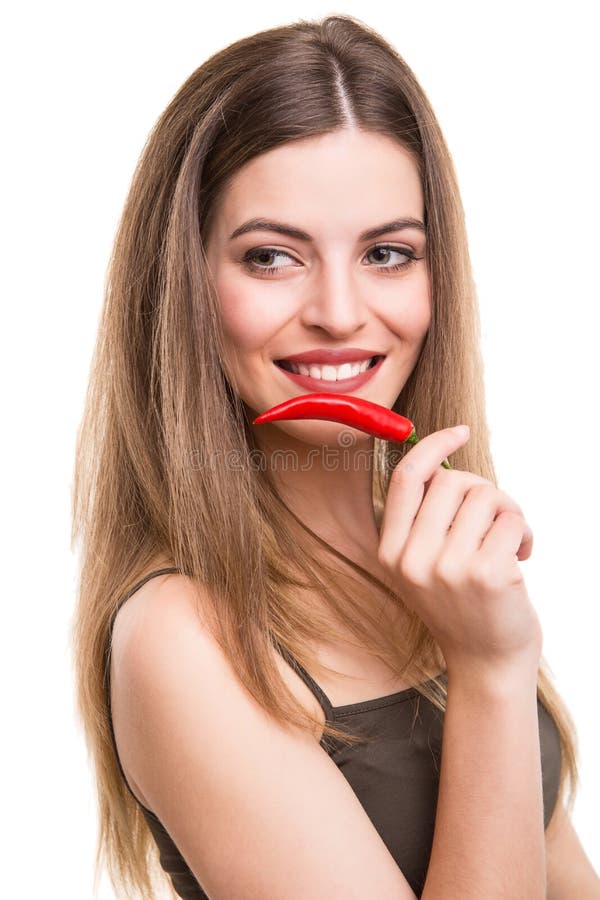 Woman eating pepper stock photo. Image of attractive - 45850168