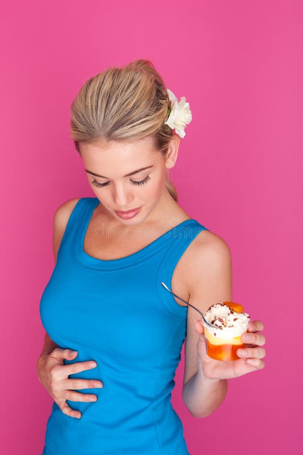 Woman eating pudding stock photo. Image of blonde, person - 20067738