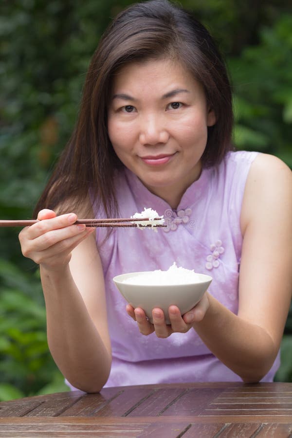Woman eating rice stock photo. Image of female, girl - 43728774