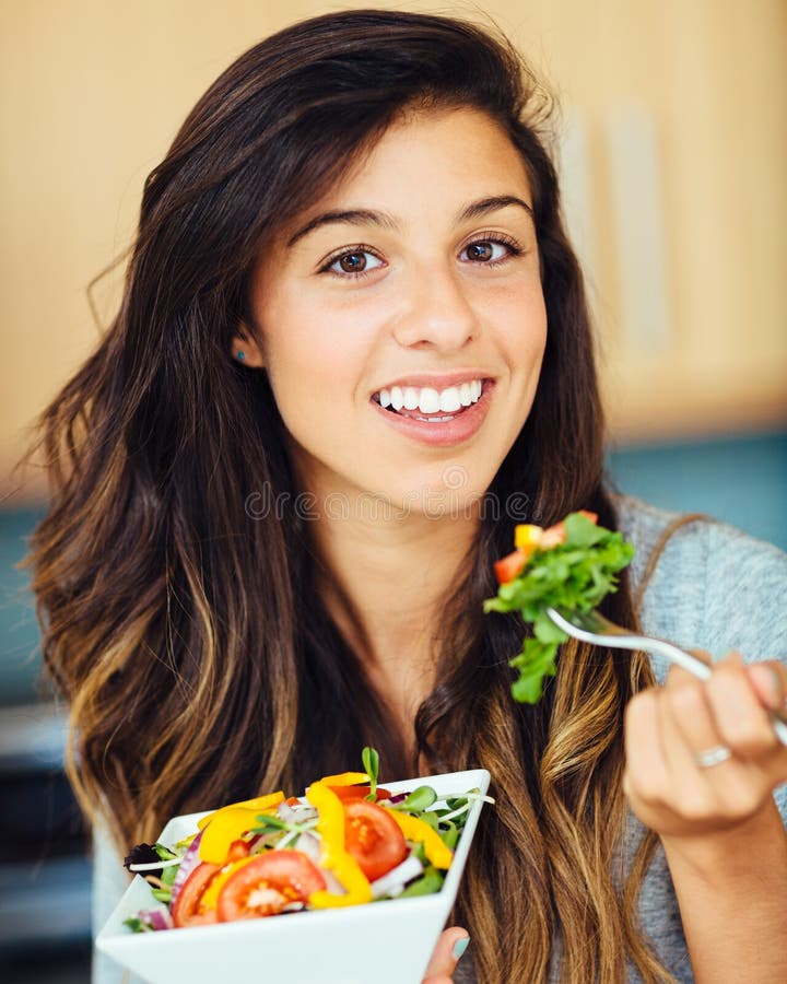 Beautiful Young Woman Eating a Bowl of Healthy Organic Salad Stock ...