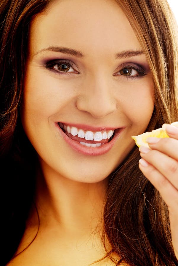Woman eating shellfish. stock photo. Image of seashell - 65949226
