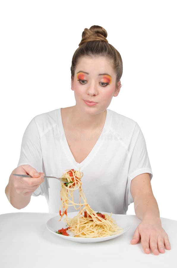 A Woman is Eating Spaghetti with a Fork Stock Photo - Image of ...