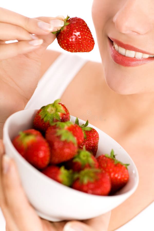 Woman eating strawberries stock image. Image of healthy - 9987475