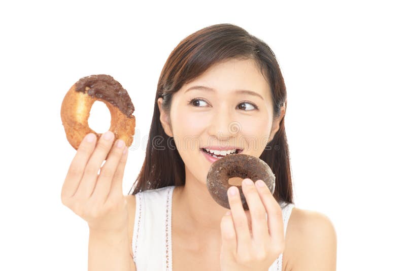Woman eating sweets stock image. Image of japanese, love - 145446765