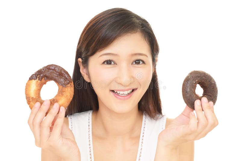 Woman eating sweets stock image. Image of beauty, calories - 92729167