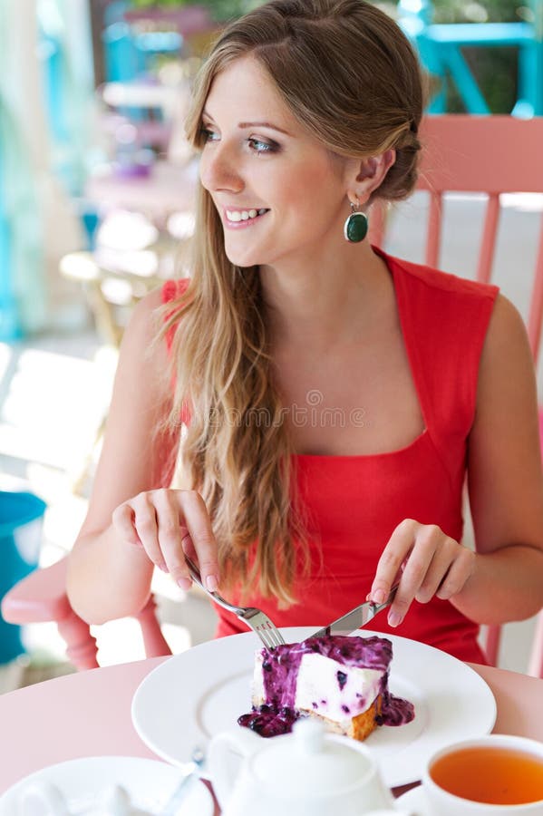 Woman Eating Tasty Cake and Smiling Stock Image - Image of enjoying ...