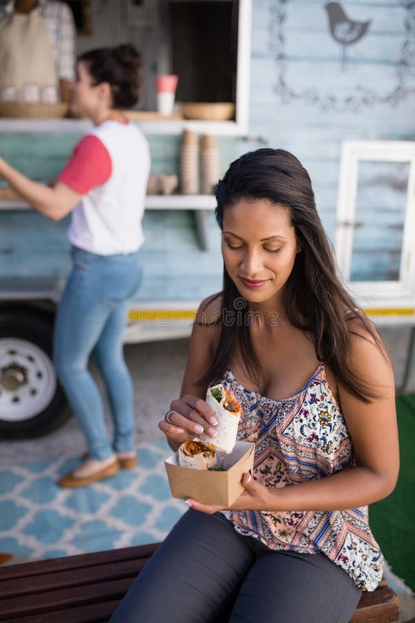 Eating a wrap stock image. Image of eating, food, fastfood - 81046005