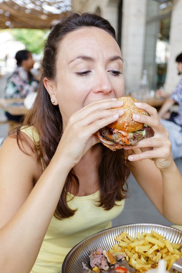 Woman Eats Fast Food Burger Stock Image - Image of burger, frenchfries ...