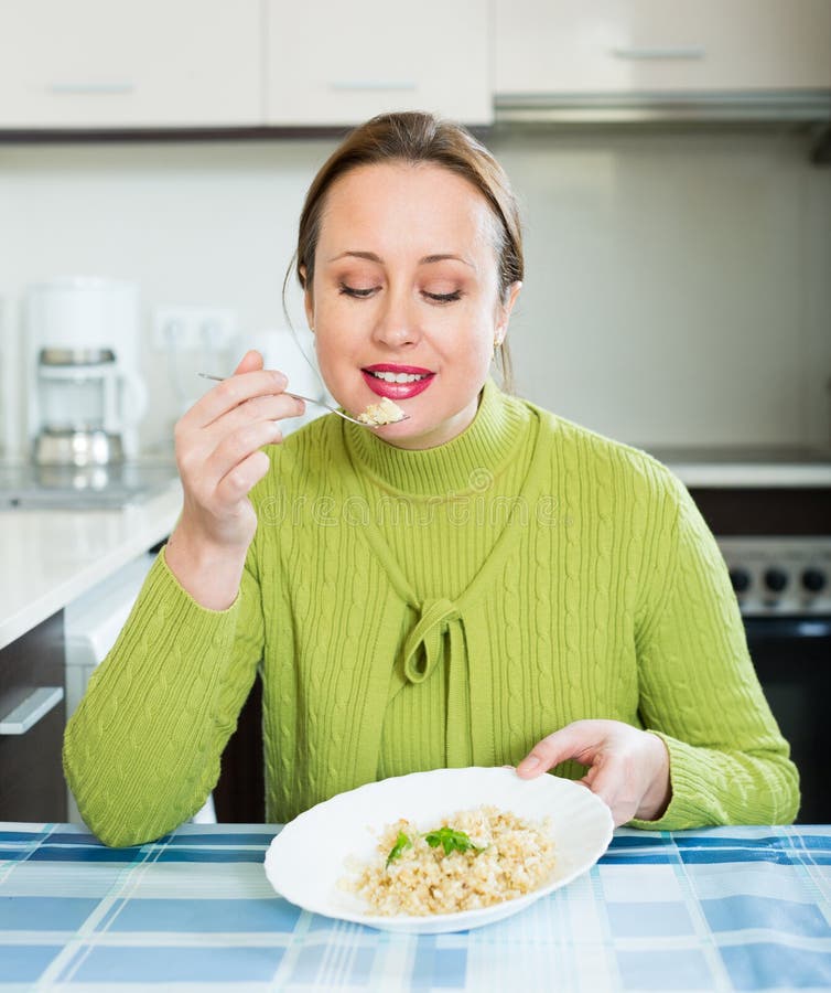 Woman eats rice stock photo. Image of happy, people, breakfast - 60431308