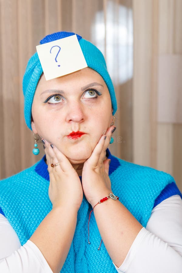 A Woman with an Emotion of Concern on Her Face and a Question Mark on ...