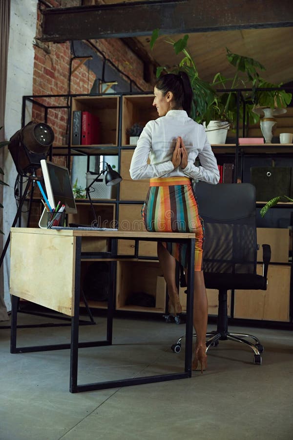 Importance of Wellness in Workplace. Female Employee in Formal Attire ...