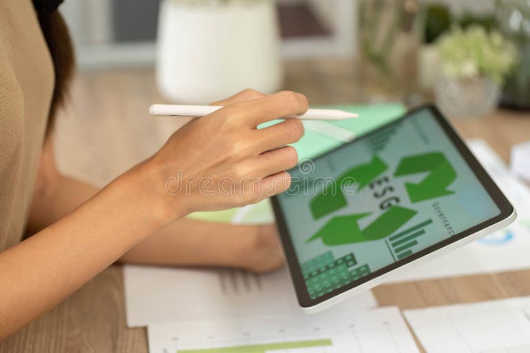 ESG Sustainability Planning Using Tablet and Environmental Models Stock ...
