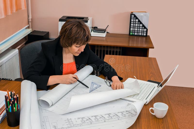 Woman Engineer Draws Drawings Stock Image - Image of helmet ... Woman Engineer Draws Drawings Stock Image - Image of helmet ...