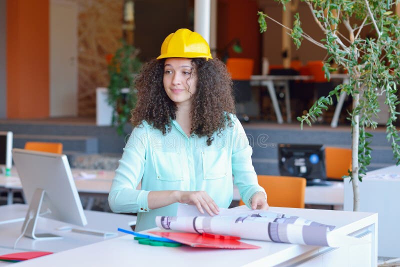 Woman Engineer Working on Blueprint in Office Stock Image - Image of ...