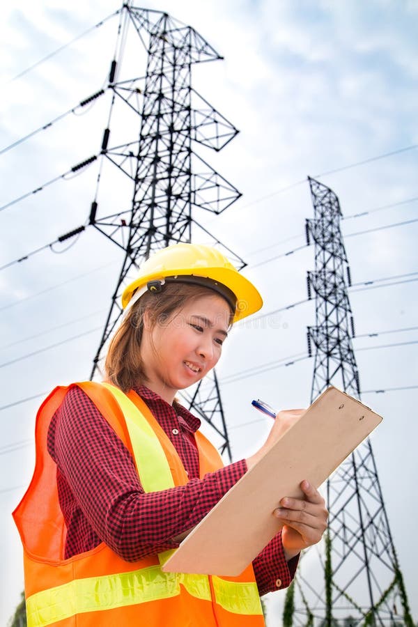 Woman Engineering Working on High-voltage Tower Stock Photo - Image of ...