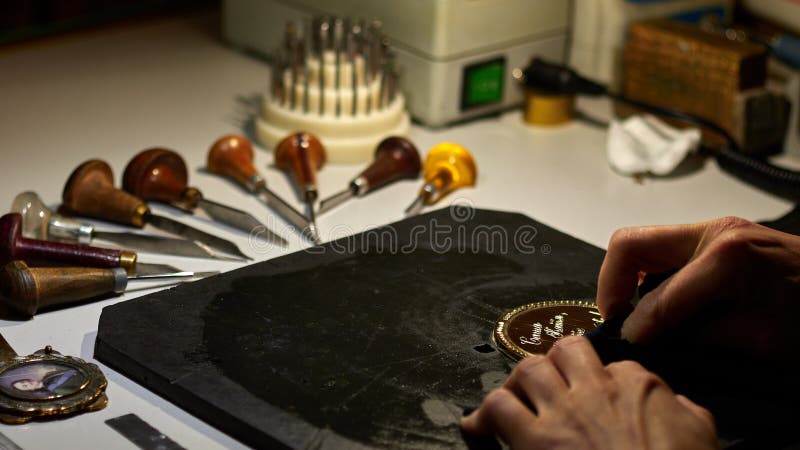 Woman engraver at work. stock image. Image of iron, manufacture - 150814311