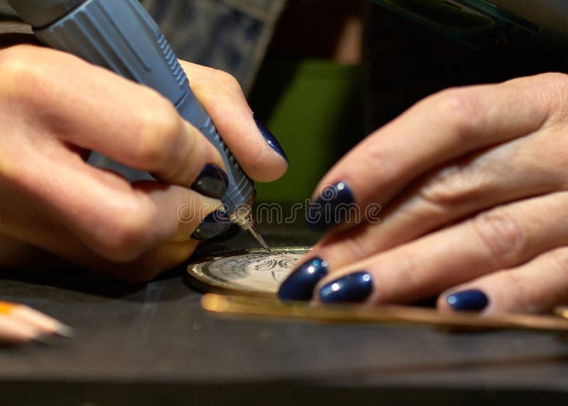 Woman engraver at work. stock photo. Image of gold, hand - 150820248