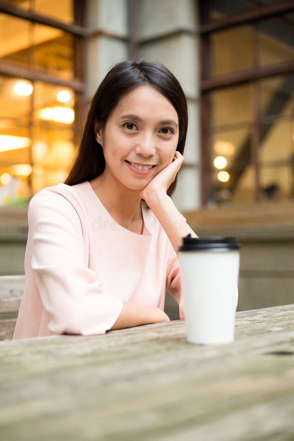 Woman enjoy her coffee stock image. Image of drink, emotion - 67960957