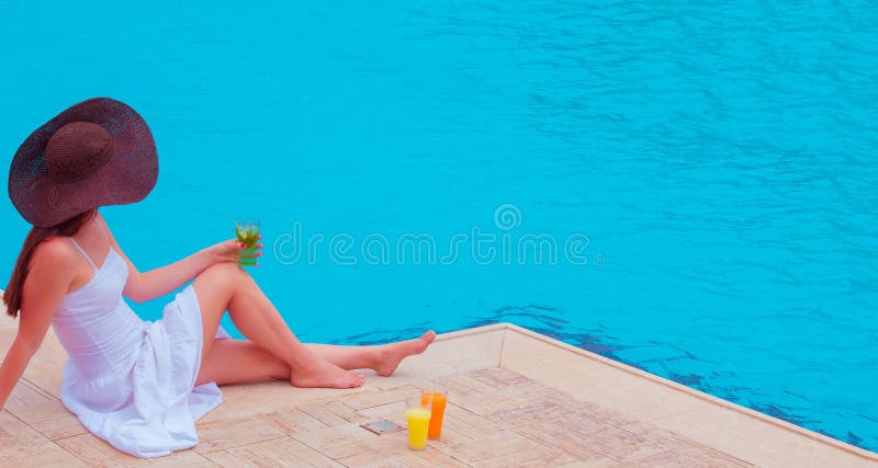 The Woman Enjoying Cocktail In A Swimming Pool Stock Image Image Of