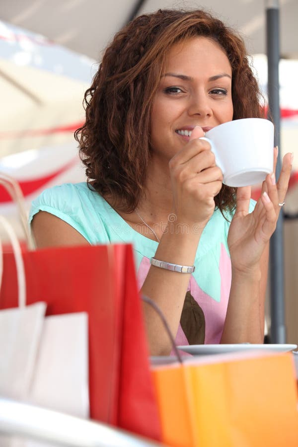 Woman enjoying coffee stock photo. Image of brunette - 31993910