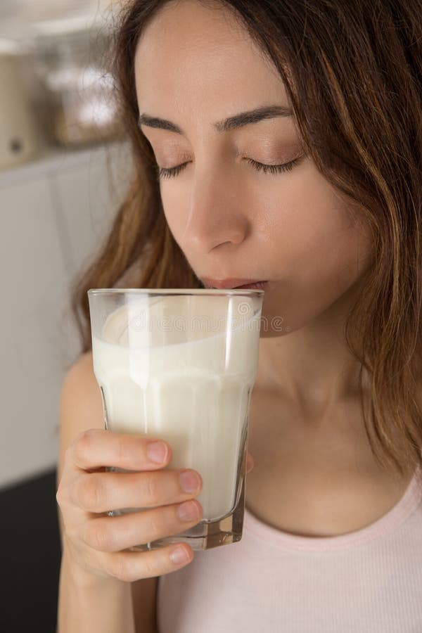 Woman Enjoying Her Glass of Milk Stock Photo - Image of diet, white ...