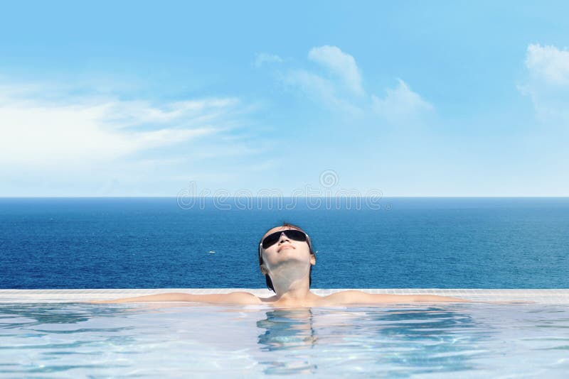 Woman Enjoying Infinity Pool Stock Photo - Image of leisure, enjoying ...
