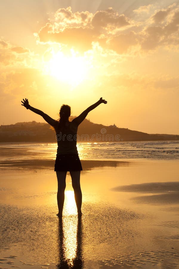 Woman Enjoying the Sun in a Beach Stock Image - Image of warm, clouds ...