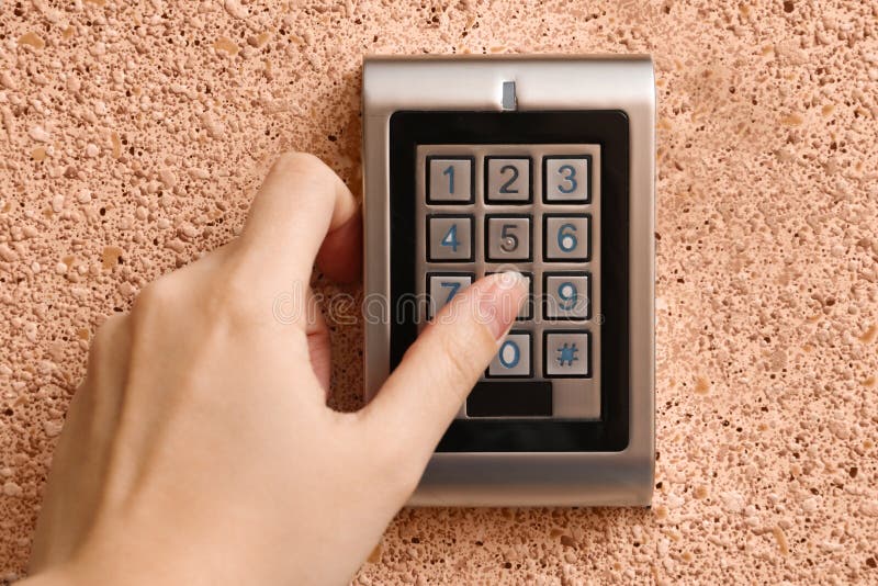 Woman Entering Code on Electronic Lock`s Keypad, Closeup Stock Photo ...